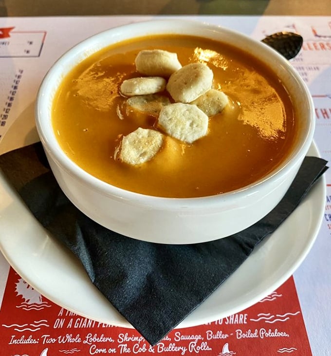 Lobster bisque that glows like liquid gold, topped with pillowy oyster crackers. One spoonful and you'll wonder why soup isn't considered a perfectly acceptable beverage.