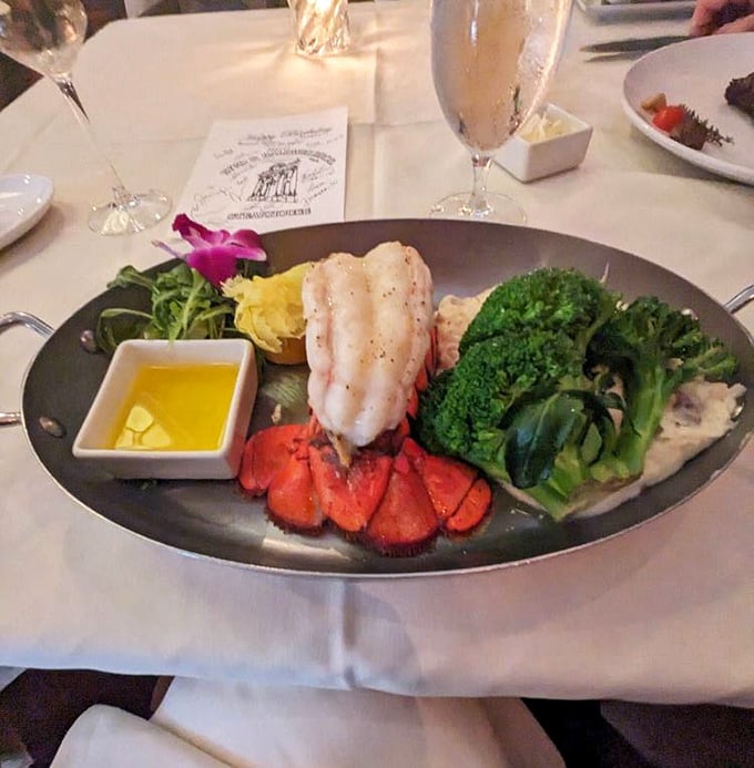 Lobster tail and fresh vegetables—proof that seafood doesn't play second fiddle at this steakhouse. That butter sauce is practically begging to be sopped up.