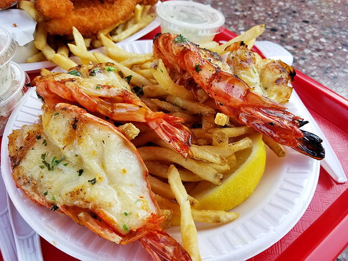 Lobster and shrimp that look like they're auditioning for a seafood calendar – perfectly grilled, generously portioned, and ready for their close-up.