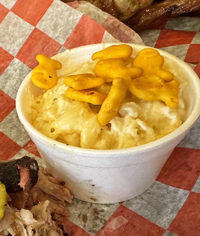 Mac and cheese that's having an identity crisis as a cloud. Those goldfish crackers aren't just swimming—they're elevating everyday comfort to art form status.