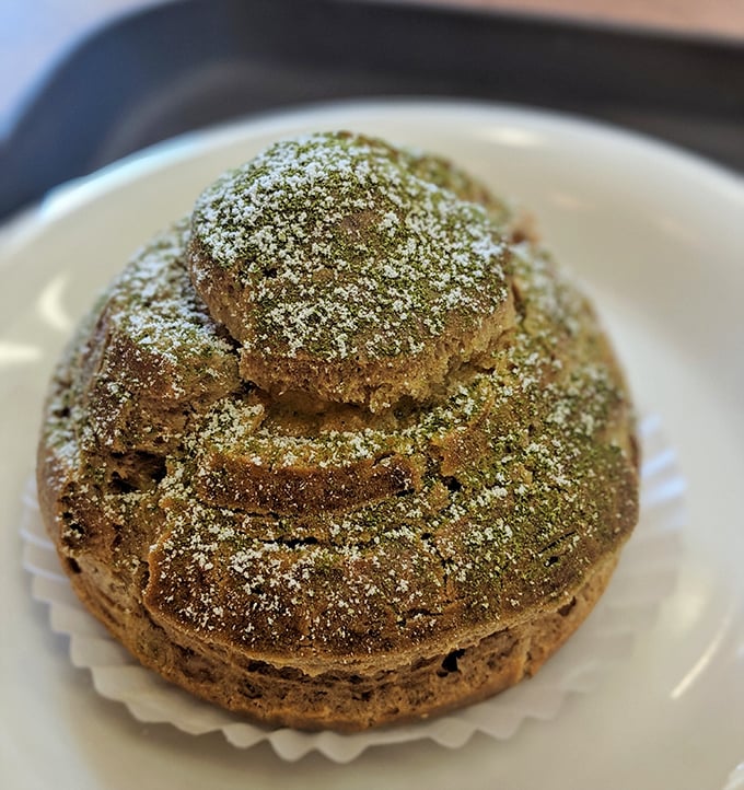 The matcha cream puff wears its green powder like Audrey Hepburn wore her little black dress—with effortless elegance and timeless appeal.