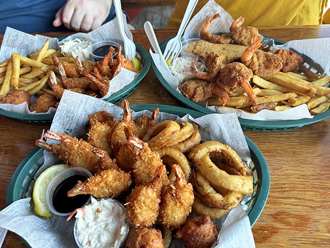 Three baskets of golden-fried treasures from the deep. The kind of feast that makes you glad stretchy waistbands were invented.