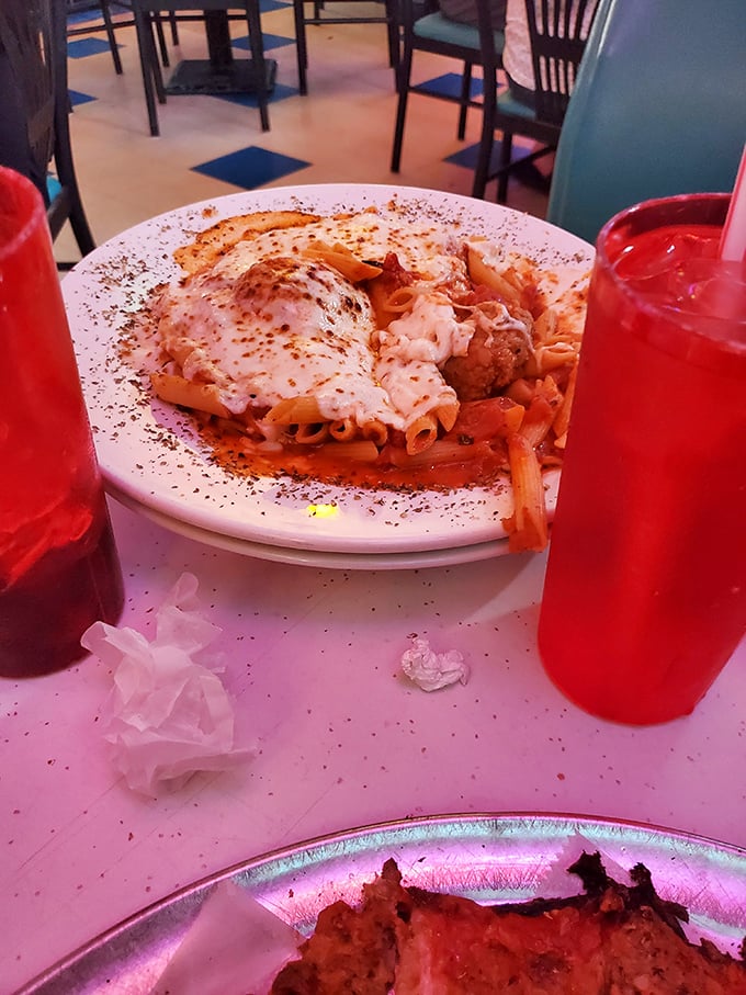 Their mostaccioli isn't just pasta—it's a saucy, cheesy reminder that Vito & Nick's mastery extends beyond their famous pies.