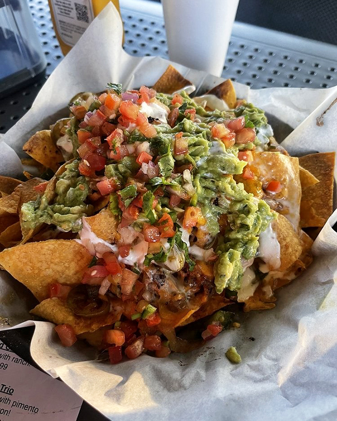 These nachos aren't messing around. Loaded with guacamole, fresh pico, and melty cheese—they're a meal disguised as an appetizer.