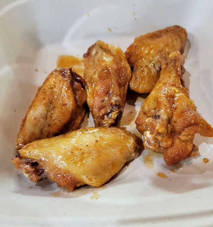 Old Bay wings: Where Maryland's favorite seasoning meets America's favorite bar food in a marriage that feels absolutely predestined.