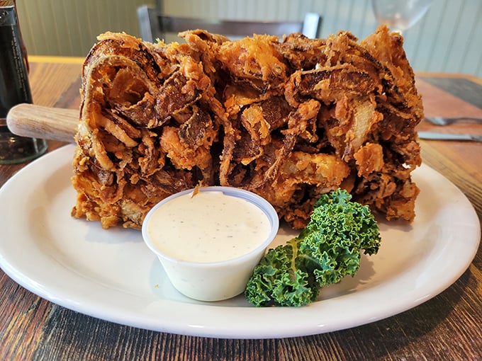 This glorious tower of crispy fried onions might just be the Leaning Tower of Delicious—architecture you can actually eat! 