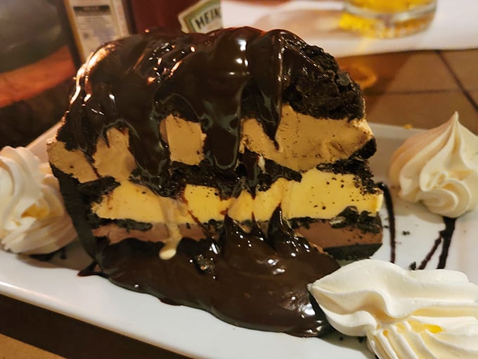 Dessert that makes you reconsider saving room – layers of chocolate and cream that render conversation temporarily impossible.