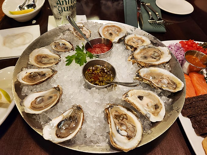 Fresh oysters on ice – nature's perfect appetizer – served with classic accompaniments that let the briny treasures shine without interference.