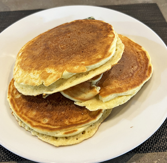These aren't just pancakes—they're fluffy discs of joy that make you question why we don't eat breakfast for every meal.