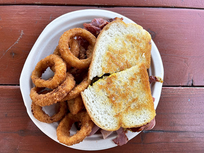 Pastrami and onion rings—the dynamic duo that proves sometimes the best supporting actors steal the show.