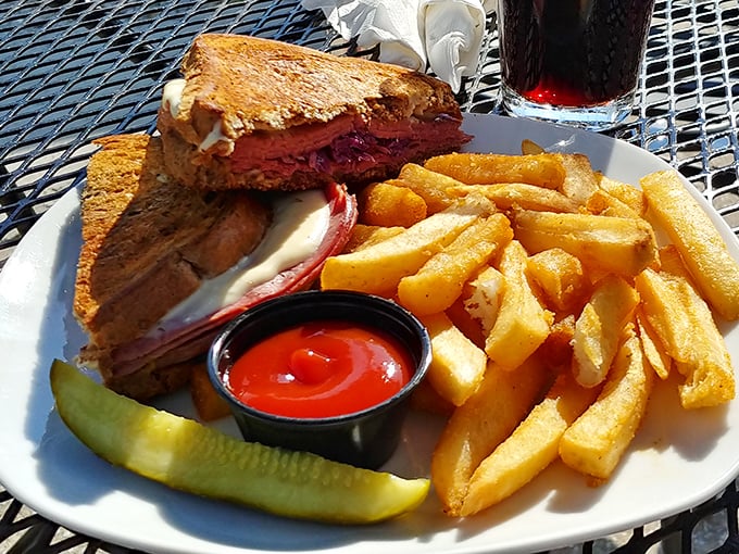 Sandwich perfection isn't complicated—just perfectly grilled bread, melty cheese, and a pickle that knows its supporting role. Comfort on a plate.