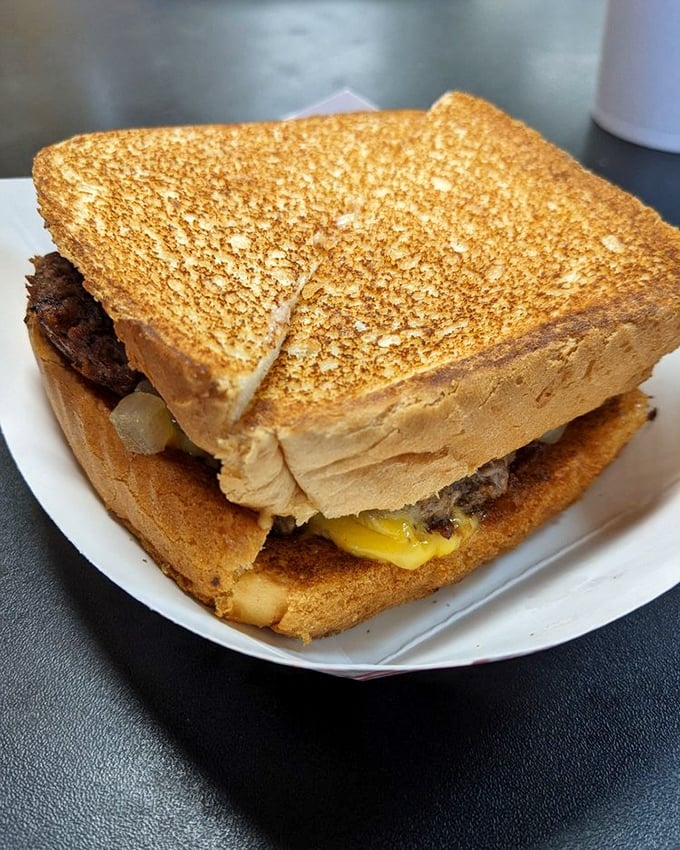 The patty melt – that magical middle ground between burger and grilled cheese where dreams are made and diets are forgotten.
