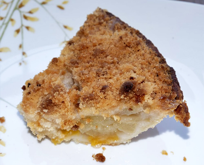 This crumb-topped masterpiece isn't just a pie—it's what other desserts dream of becoming when they grow up.