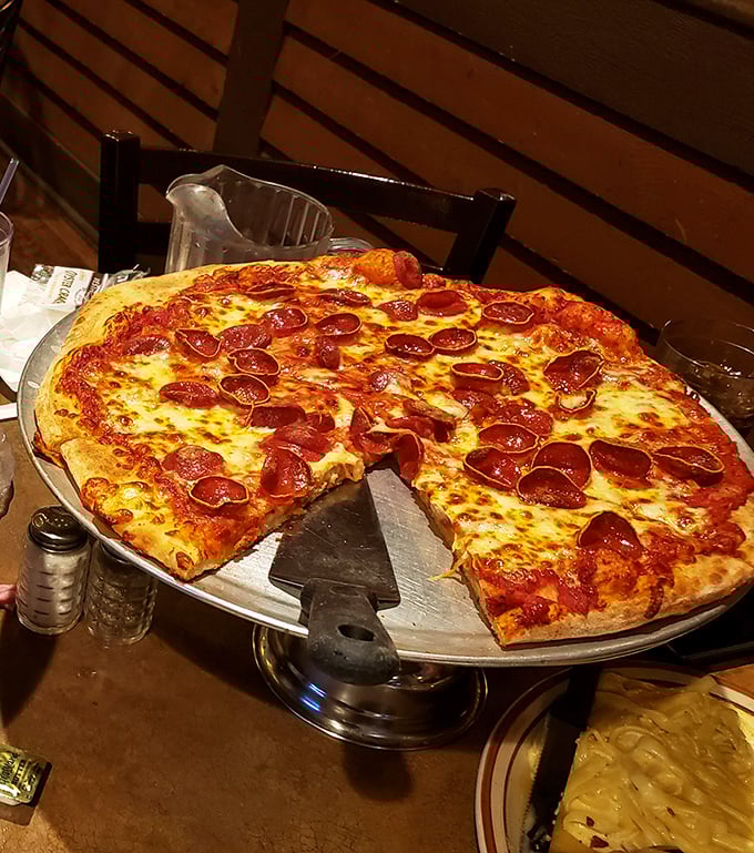 The pepperoni pizza that started it all—perfectly bubbled cheese, crisp-edged pepperoni cups that cradle tiny pools of savory goodness.