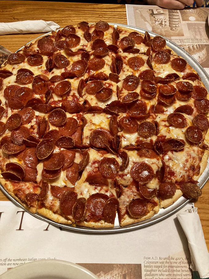 Pepperoni that curls into little flavor cups? That's not just pizza—that's poetry. Each slice delivers the perfect ratio of crisp crust, tangy sauce, and meat discs.