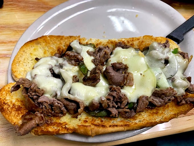 This open-faced Philly cheesesteak doesn't need Philadelphia's approval – the melted cheese blanket over tender beef speaks for itself.
