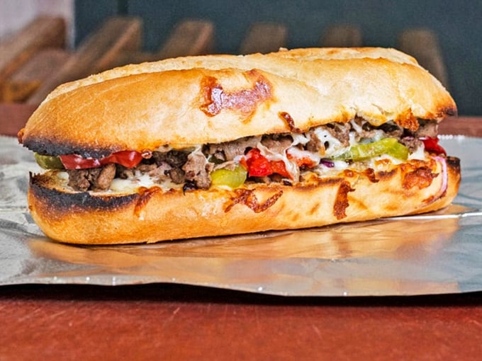 The Philly cheesesteak sandwich: where beef, peppers, and melted cheese come together like the world's most delicious rock band.