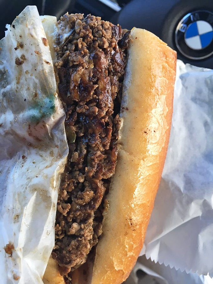 Behold the cheesesteak in its natural glory – tender beef, perfectly melted cheese, and a roll that deserves its own fan club.