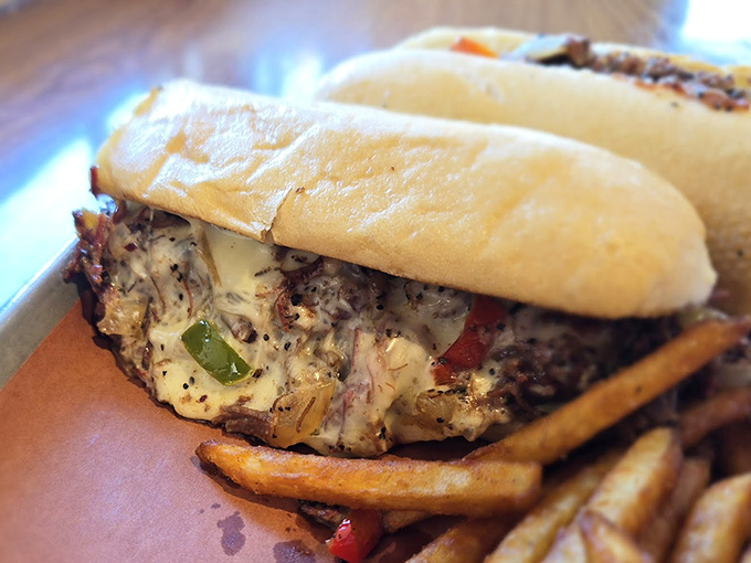 This sandwich doesn't just blur the line between Philly and Portland—it erases it completely. Melted cheese mingles with tender meat in a handheld masterpiece.