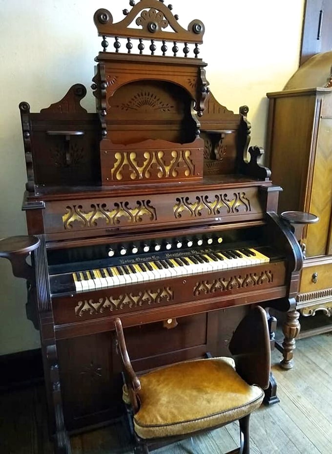 An ornate piano waits patiently for someone to bring its melodies back to life again.