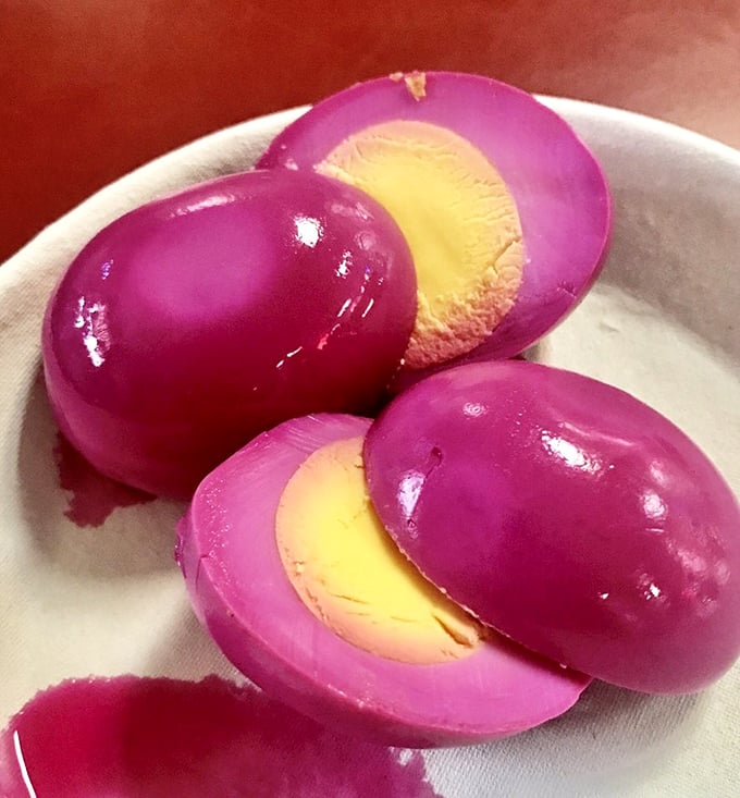 Those purple pickled eggs look like Easter gone rogue, but trust me, they're delicious rebels.
