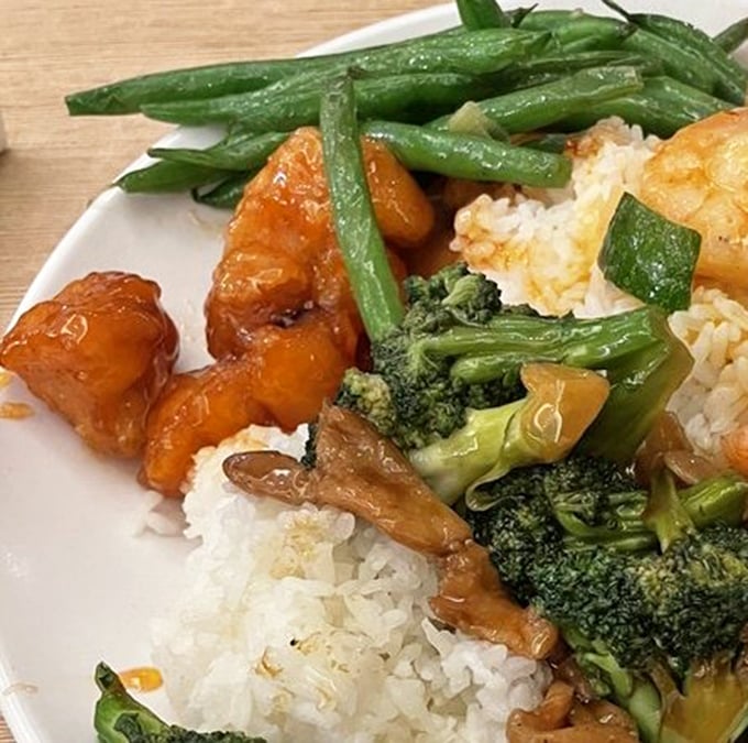 The classic sweet-savory combo that never disappoints – tender chicken, crisp vegetables, and rice. Comfort food that speaks a universal language.
