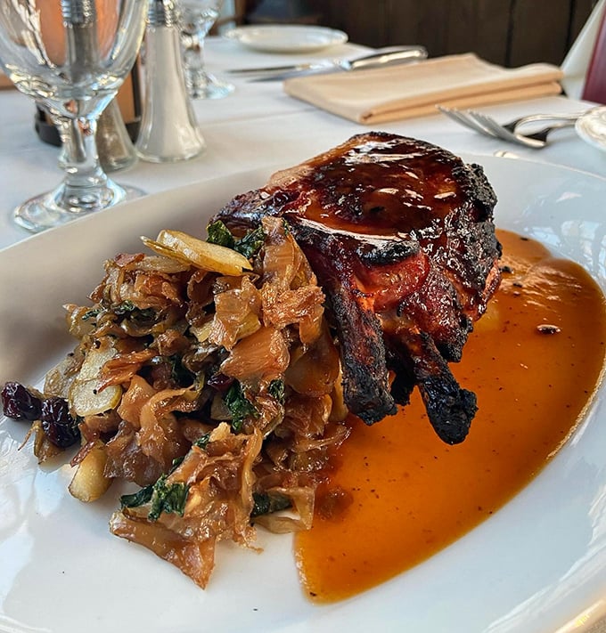 This isn't just a pork chop—it's a masterpiece of caramelization swimming in a sauce so good you'll consider drinking it directly.
