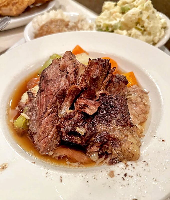 This isn't just pot roast; it's a tender surrender. Fork-tender beef with vegetables that have soaked up all life's goodness.