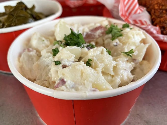 Creamy potato salad stands ready for duty—the unsung hero waiting to rescue your taste buds when the heat becomes too much.