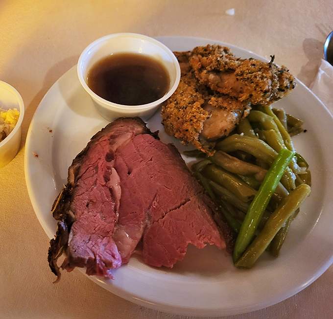 Prime rib so perfectly pink it could make a vegetarian reconsider their life choices. Those green beans aren't just along for the ride either.