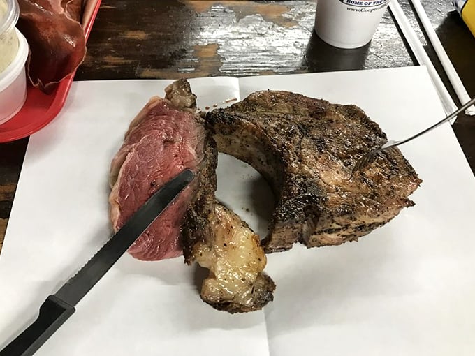 The prime rib and pork chop duo—a carnivore's dream team that makes vegetarians question their life choices from tables away.