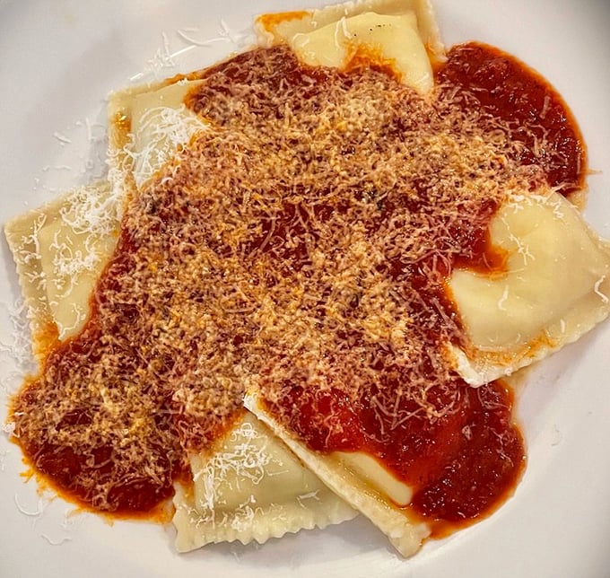 Ravioli swimming in red sauce and showered with cheese – proof that the simplest pleasures are often the most profound.