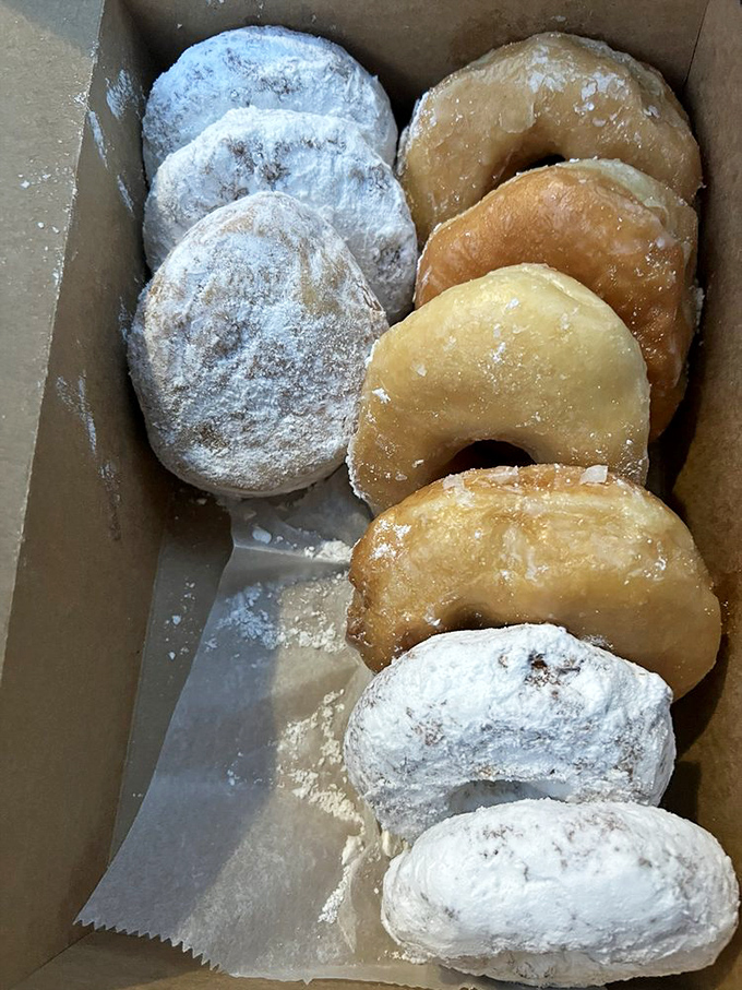 A box of joy in its most perfect circular form. Like snowflakes, no two donuts are exactly alike, but unlike snowflakes, these won't melt before you enjoy them.