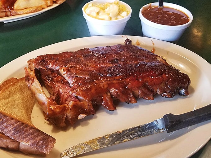 Behold the ribs—that bark, that smoke ring, that glistening finish. The kind of barbecue that makes conversation stop and eyes close in appreciation.