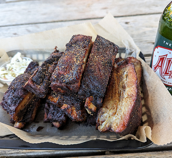 Ribs with bark so perfect, they deserve their own museum exhibit. That smoke ring isn't just for show—it's a flavor timeline of patience.