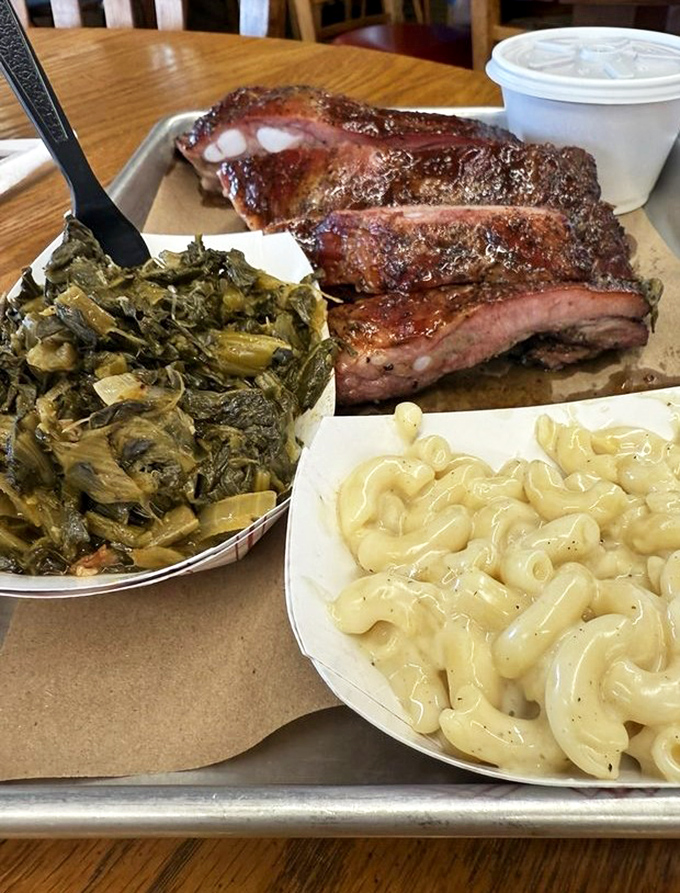 These ribs don't need a resume—their credentials are in that perfect bark and the way the meat clings to the bone just enough to make you work for it.