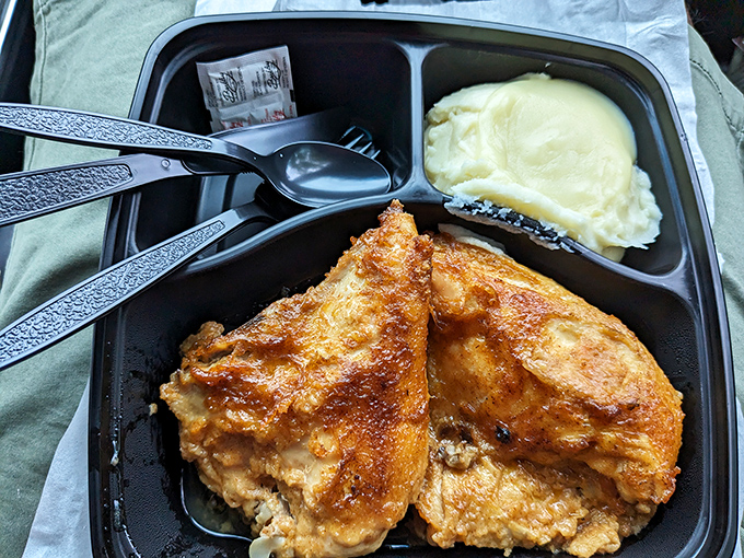 Golden-brown chicken that would make your grandmother both proud and jealous, nestled beside cloud-like mashed potatoes ready for their gravy bath.