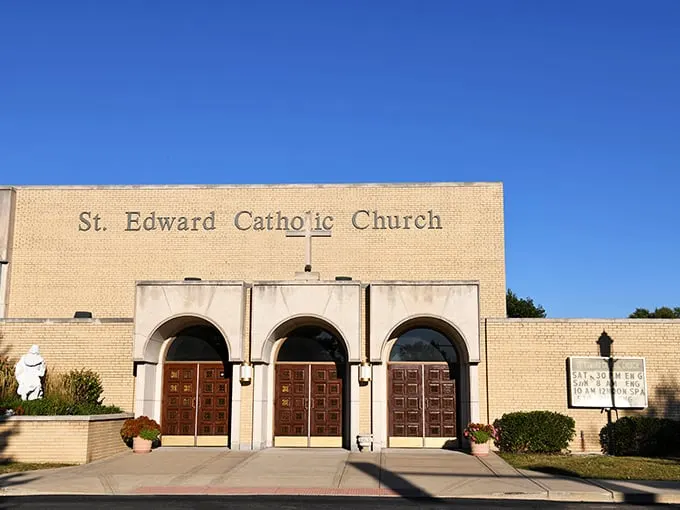 St. Edward Catholic Church stands as a testament to Rockford's diverse faith communities, its golden brick glowing warmly in the afternoon sun.