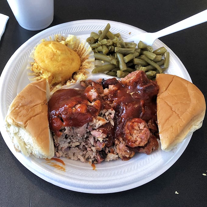 This isn't just a sandwich—it's a carefully constructed monument to smoke, spice, and everything nice in the barbecue universe.