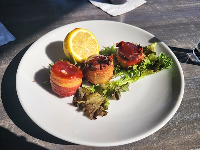 Bacon-wrapped scallops: where sea meets swine in perfect harmony. These little flavor bombs are dressed in their Sunday best, ready for their close-up.