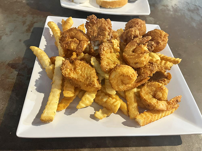 Golden-fried seafood and crispy fries—the kind of platter that makes you want to high-five the chef and cancel your afternoon appointments.