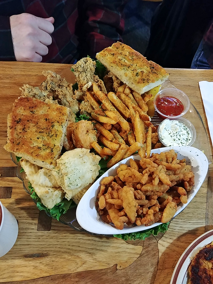 A wooden board loaded with seafood treasures—this isn't just lunch, it's a maritime celebration on a plate.