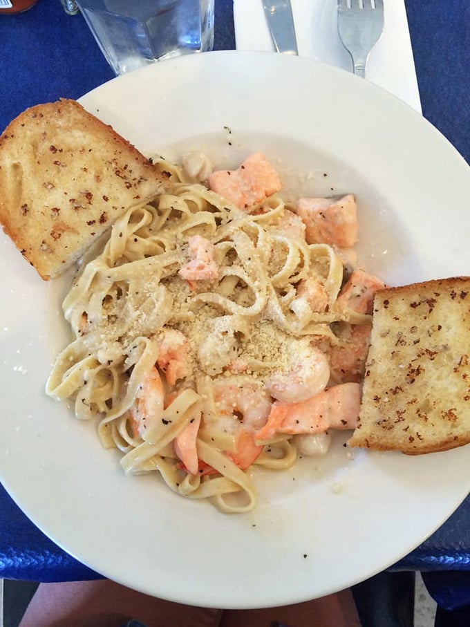 Seafood pasta that doesn't skimp on the stars of the show. The salmon and prawns aren't just guests at this party – they're the headliners.