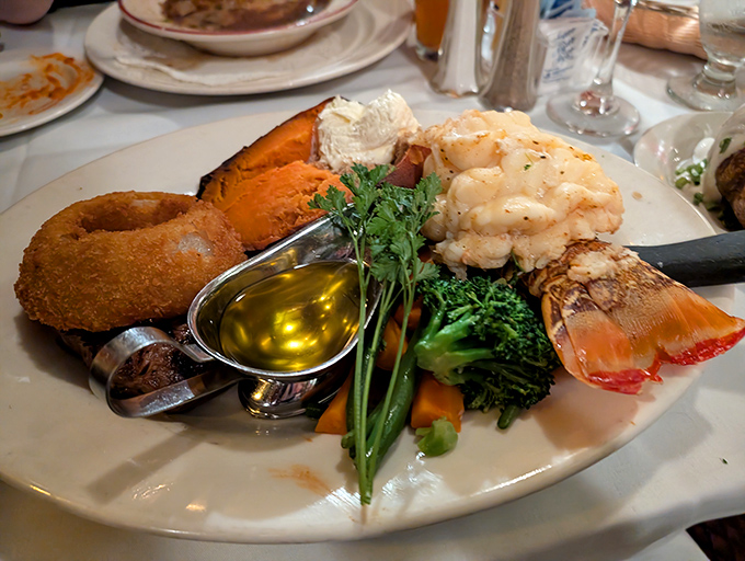 A seafood platter that rivals Neptune's own dinner table, complete with lobster tail and that essential side of drawn butter.