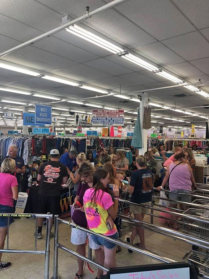 The universal language of thrift: shoppers of all ages united in the communal hunt, each cart a vessel of possibility.