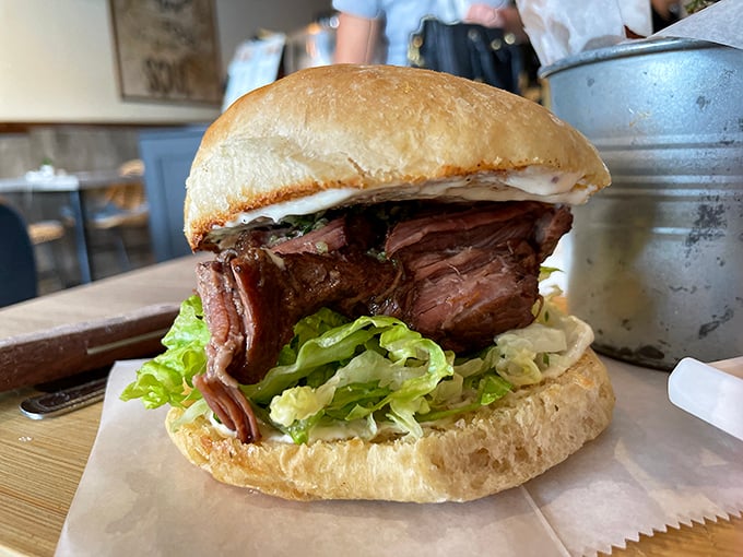 The legendary short rib sandwich in all its glory. Tender meat that surrenders at first bite, nestled in a bun that somehow contains this beautiful chaos.