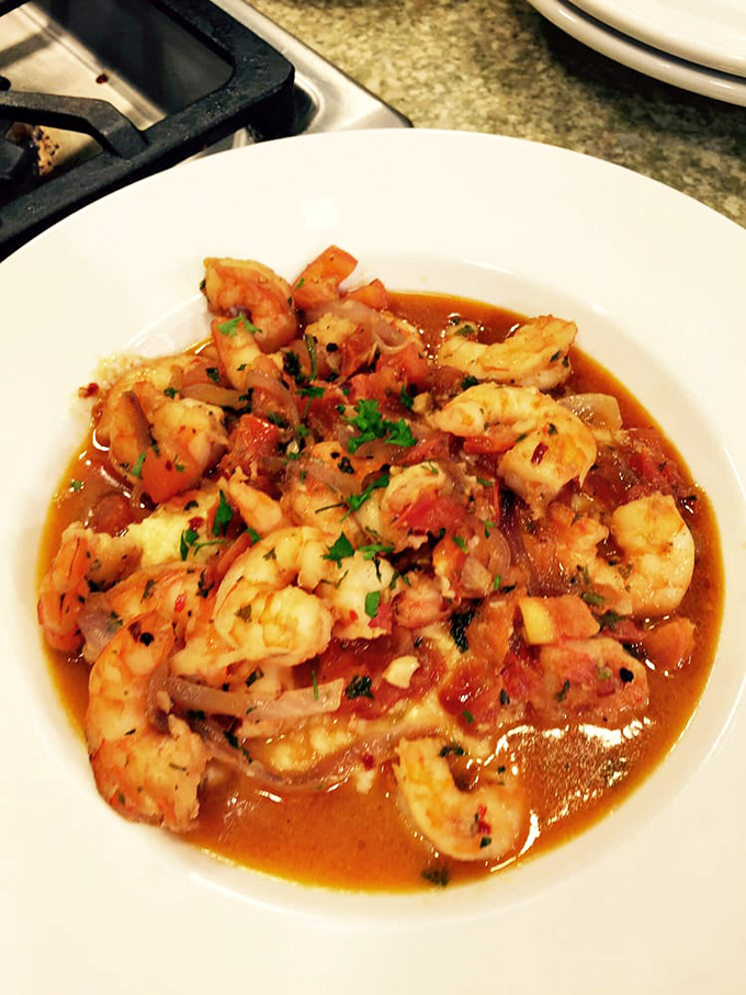 Shrimp swimming in a tomato broth so good you'll be tempted to drink it straight from the bowl when nobody's looking.