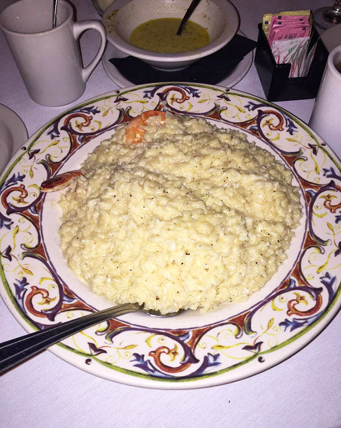 This risotto isn't just creamy—it's the kind of dish that makes you slow down mid-conversation, close your eyes, and momentarily forget you're in public.