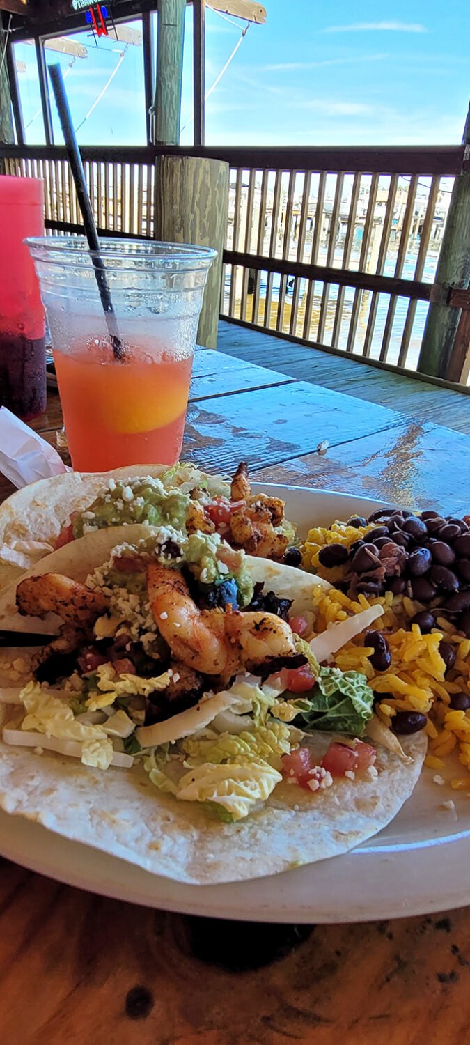 Waterfront dining at its finest—where your shrimp tacos come with a side of spectacular views and your drink matches the sunset.
