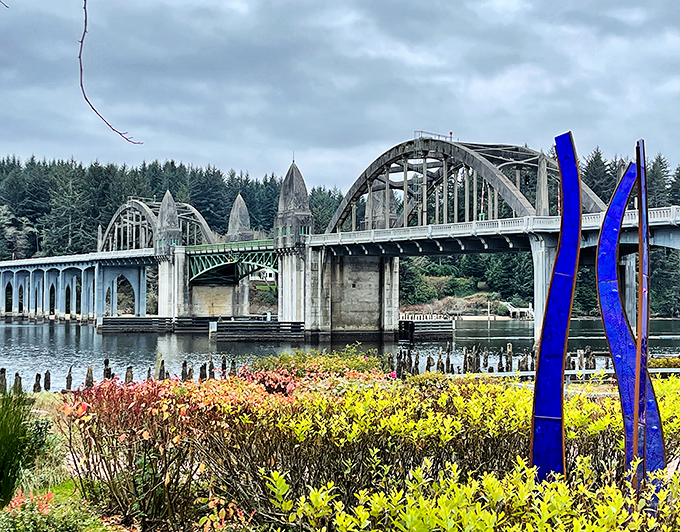 The Siuslaw River Bridge stands like Art Deco poetry written in concrete and steel across the water.